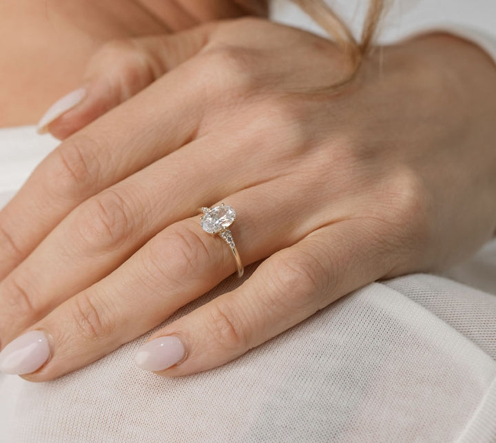 Krystal Oval centre stone with diamonds in the band – Harry & Co Jewellery
