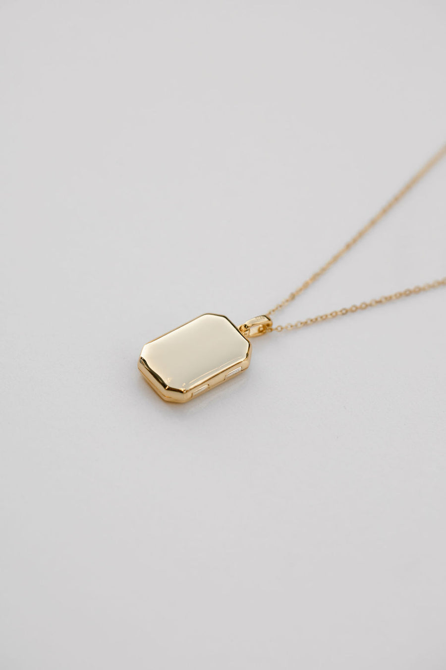 Modern Rectangular Locket for Engraving in Gold – Harry & Co Jewellery